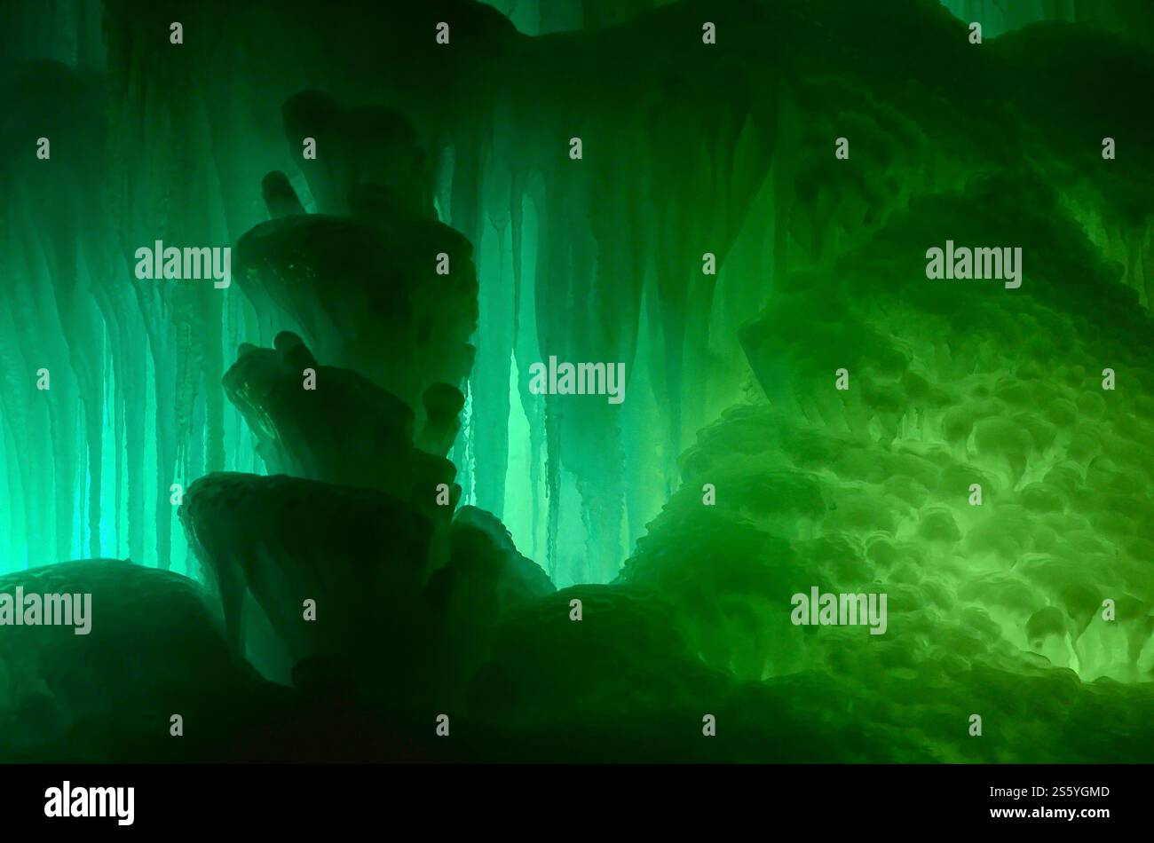 Huge ice icicles. Fragment of large blocks of ice frozen waterfall of ...