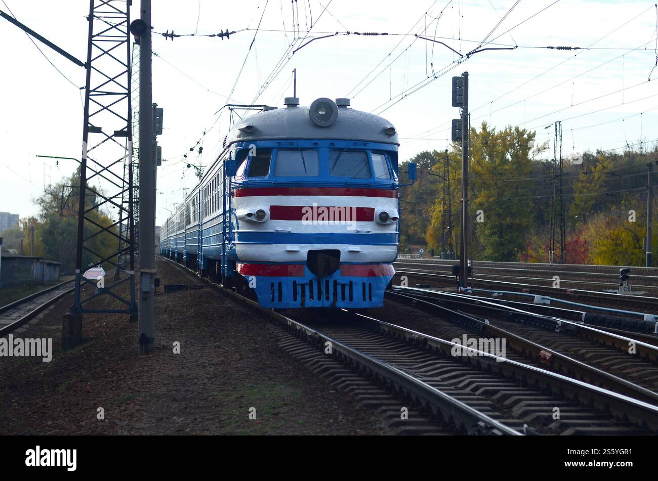 Suburban electric train. Old soviet electric train with outdated design ...