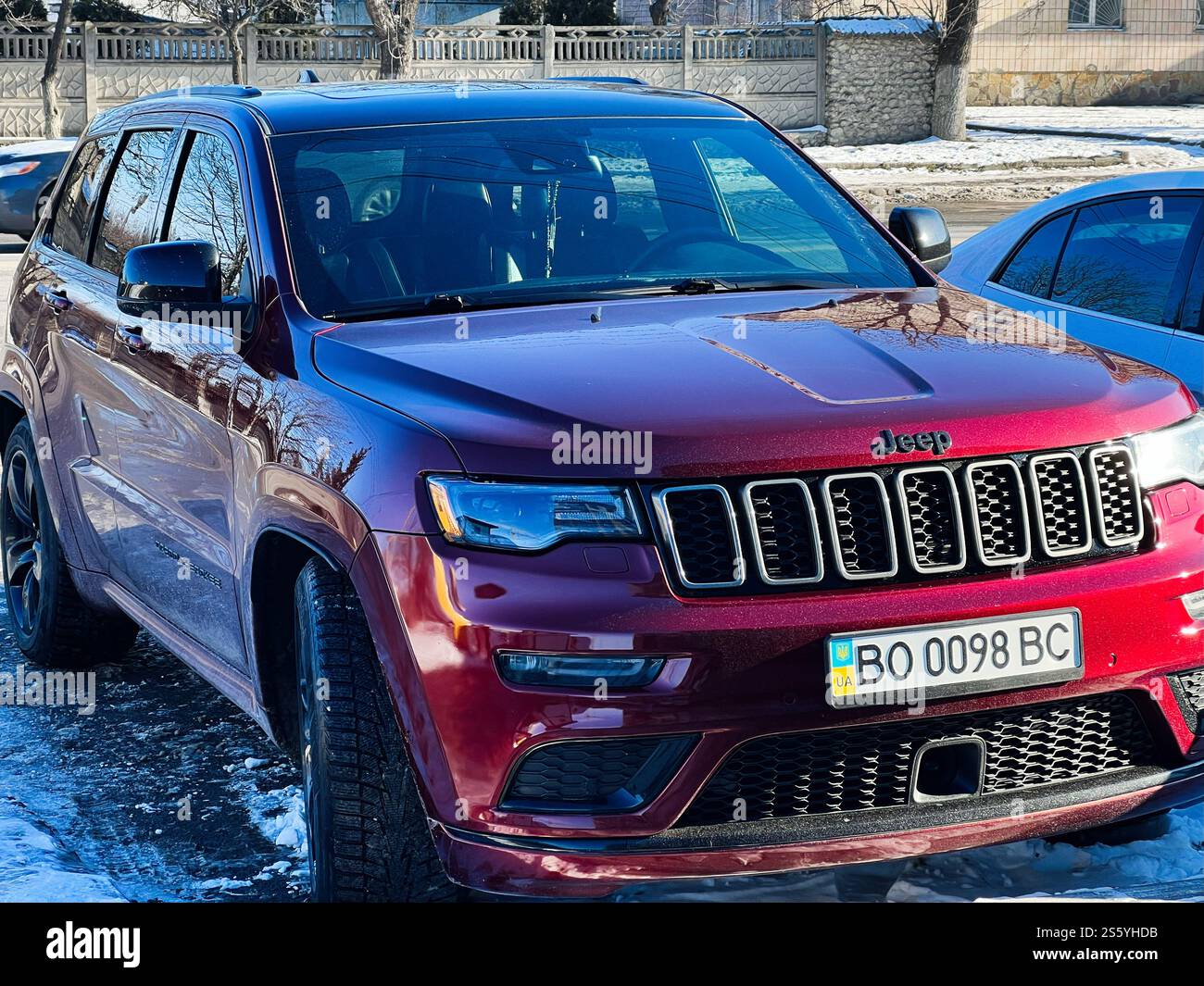 Kyiv, Ukraine - January 14, 2025: A red Jeep Grand Cherokee SUV parked ...
