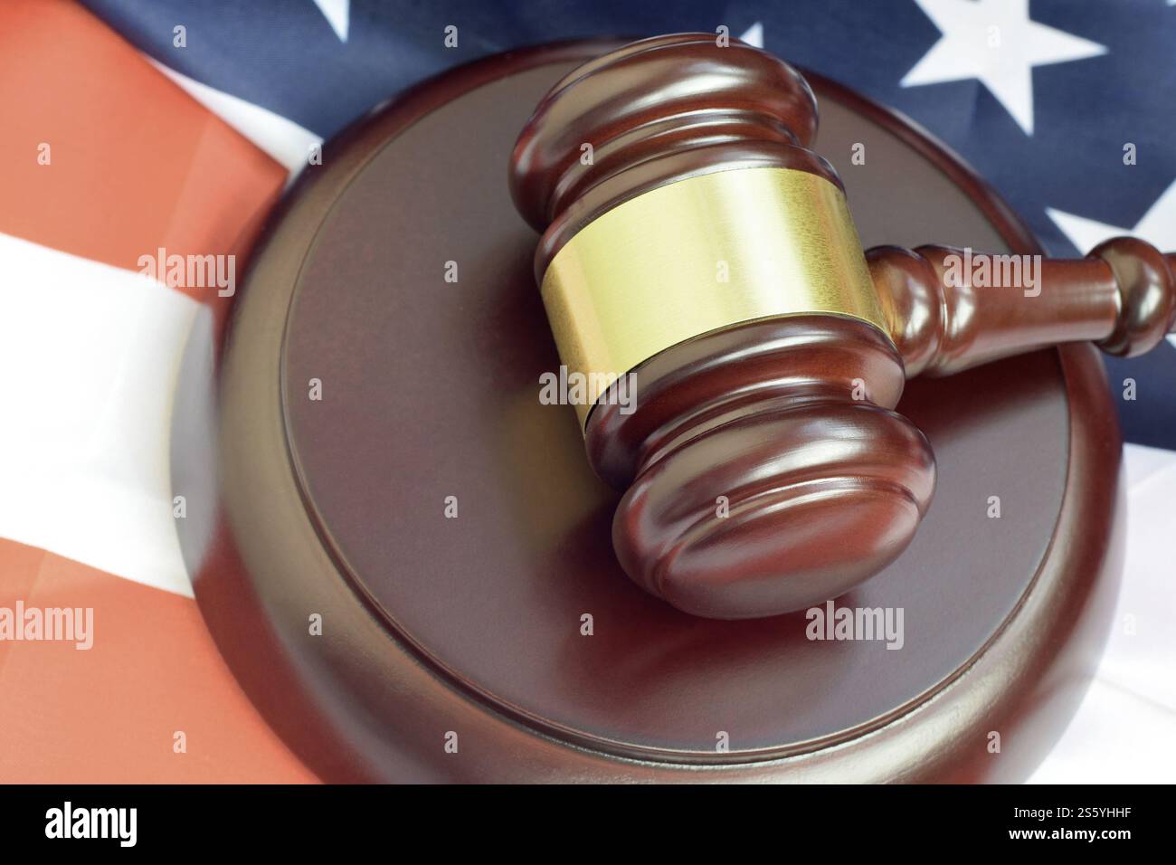 Justice mallet on United States flag in a courtroom during a judicial ...
