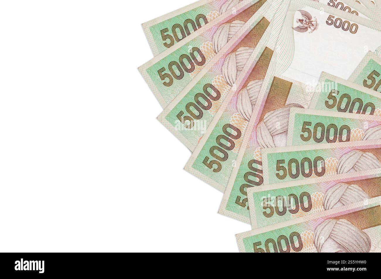 5000 Indonesian rupiah bills lies isolated on white background with ...