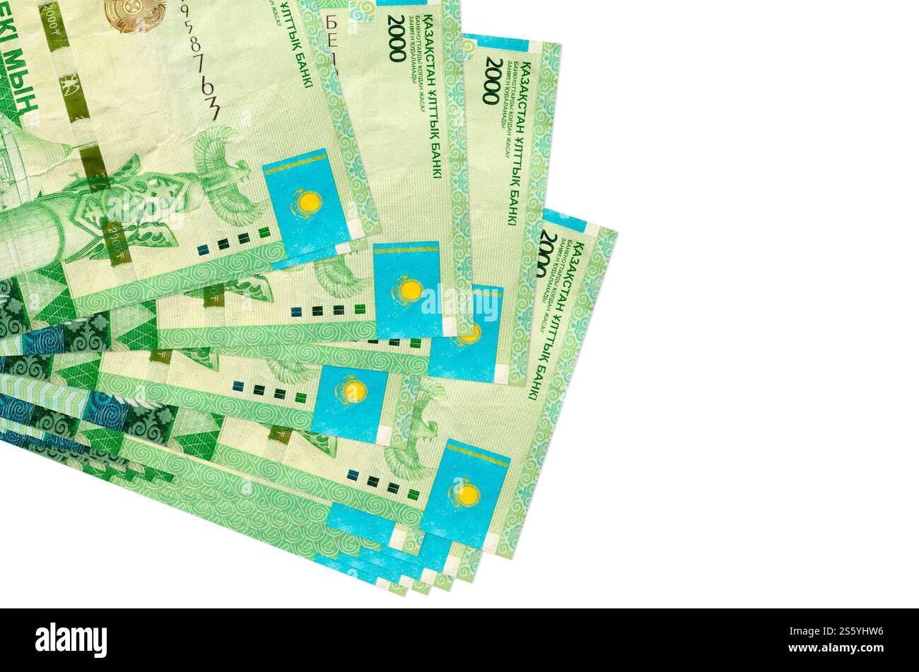 2000 Kazakhstani tenge bills lies in small bunch or pack isolated on ...