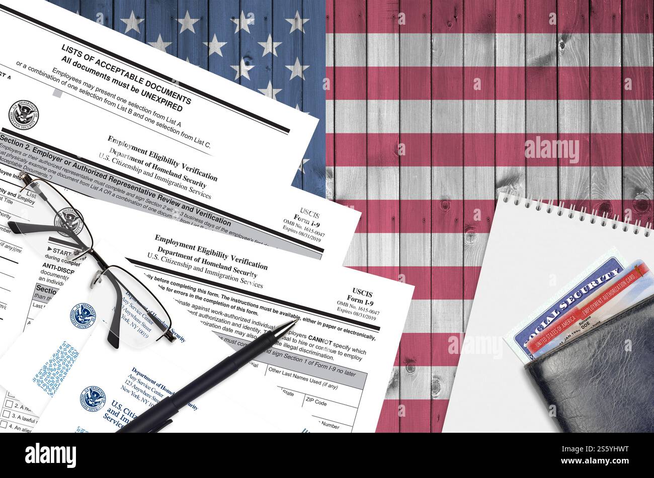 USCIS form I-9 Employment eligibility verification lies on flat lay ...