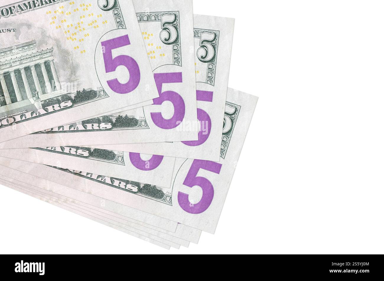 5 US dollars bills lies in small bunch or pack isolated on white ...