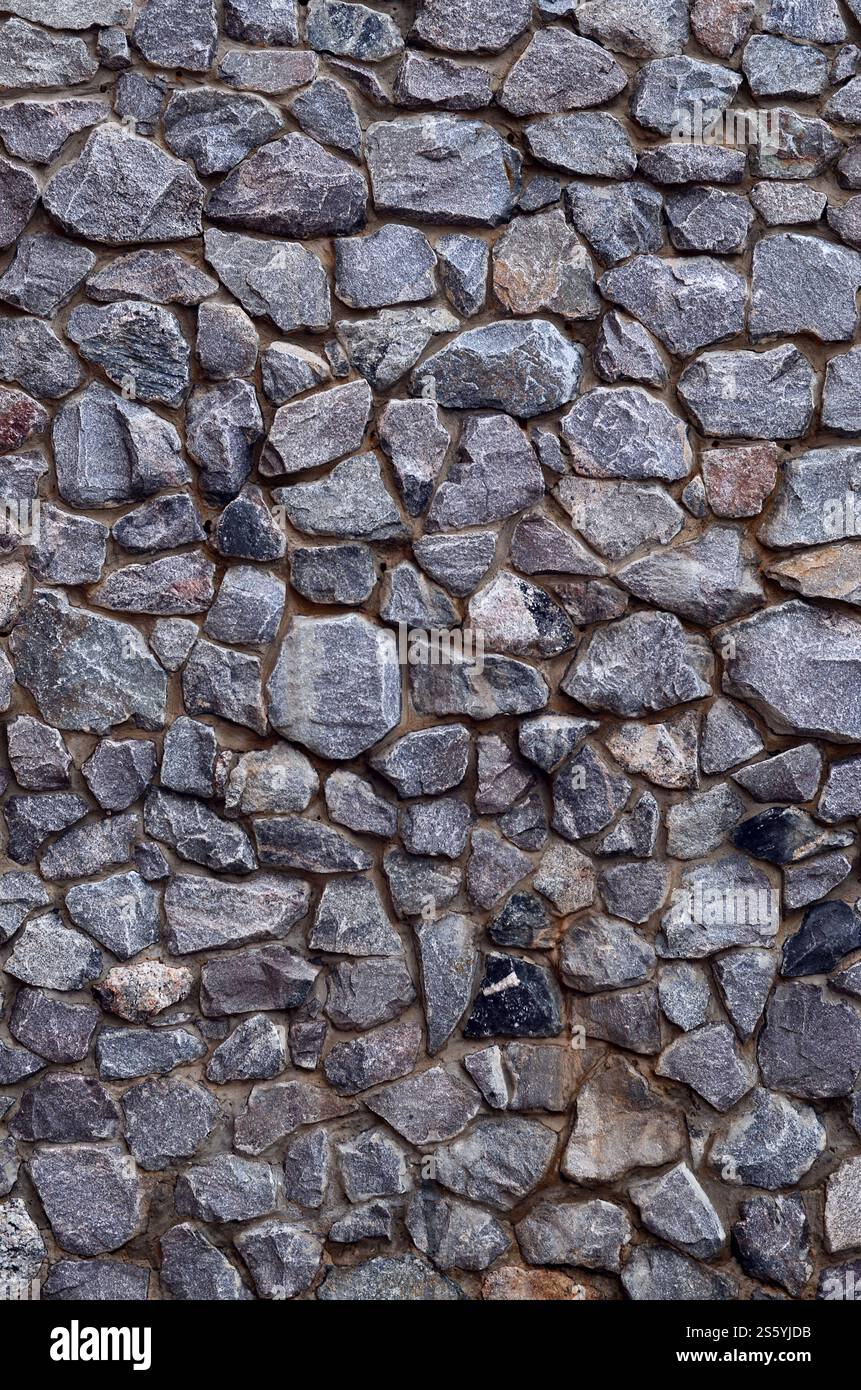 Stone wall background - building feature. Texture of thick and strong ...