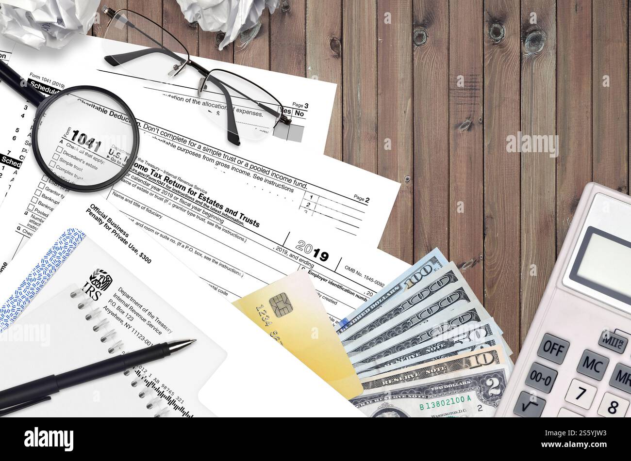 IRS form 1041 Income tax return for estates and trusts lies on flat lay ...