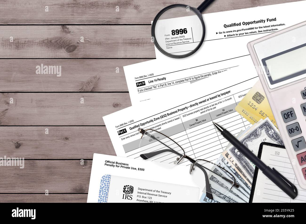 IRS form 8996 Qualified opportunity fund lies on flat lay office table ...