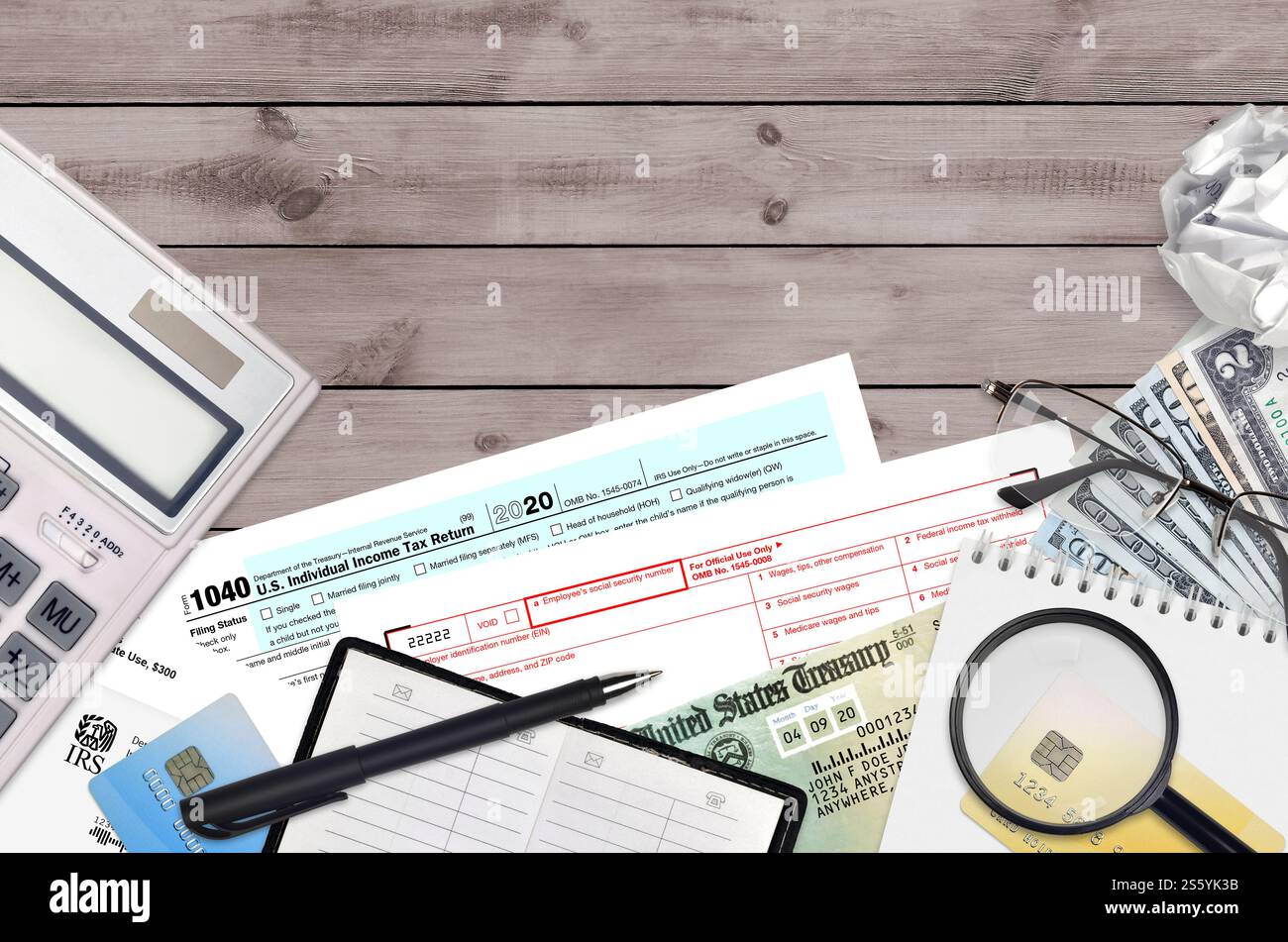 IRS form 1040 Individual income tax return and W-2 wage and tax ...