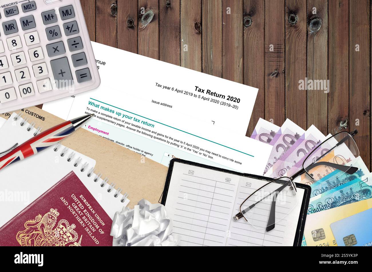 English form sa100 Tax return by HM revenue and customs lies on table ...