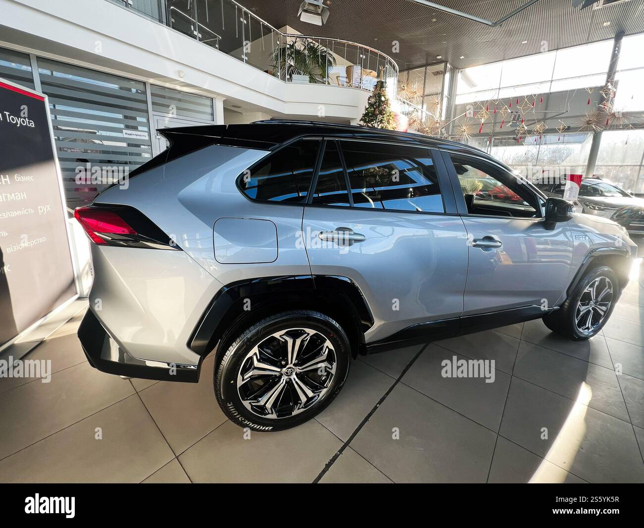 Kyiv, Ukraine - January 14, 2025: A stylish silver Toyota Rav 4 Hybrid ...