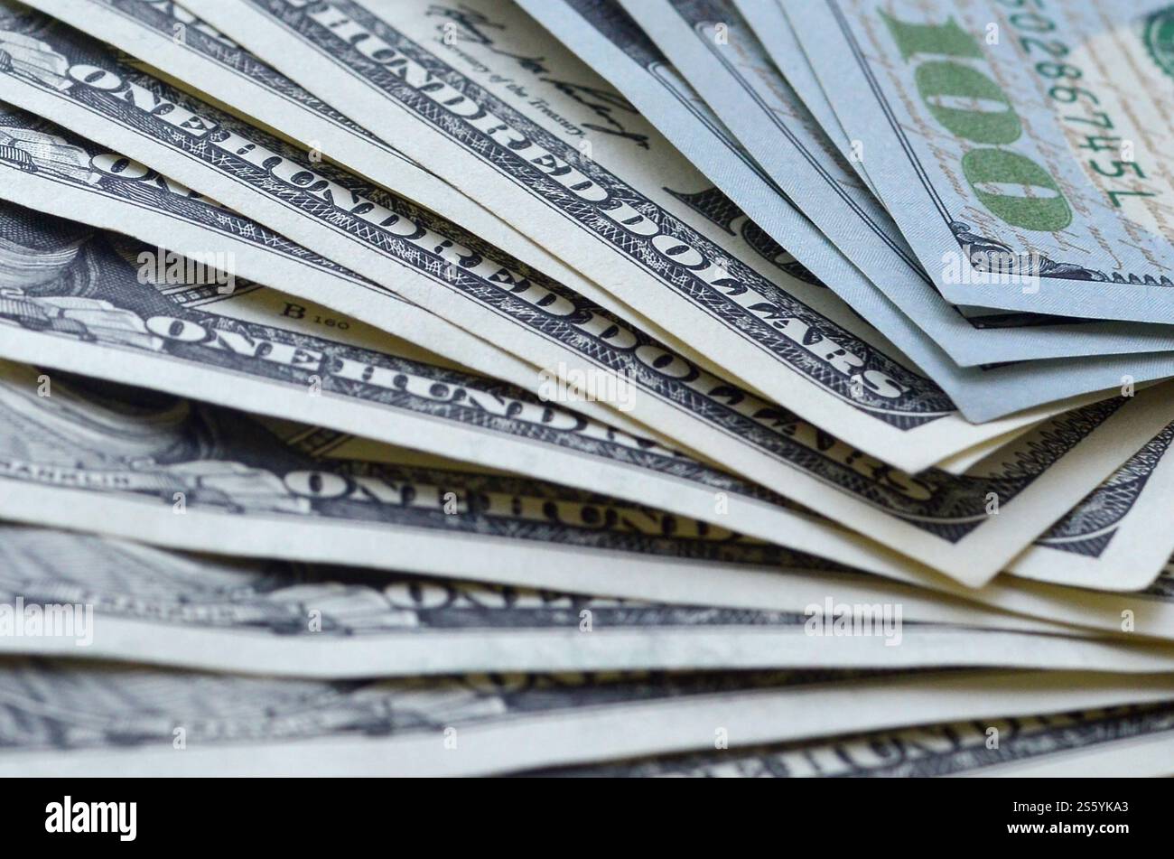 Background of 100 dollar bills. Abstract textured backdrop with many ...