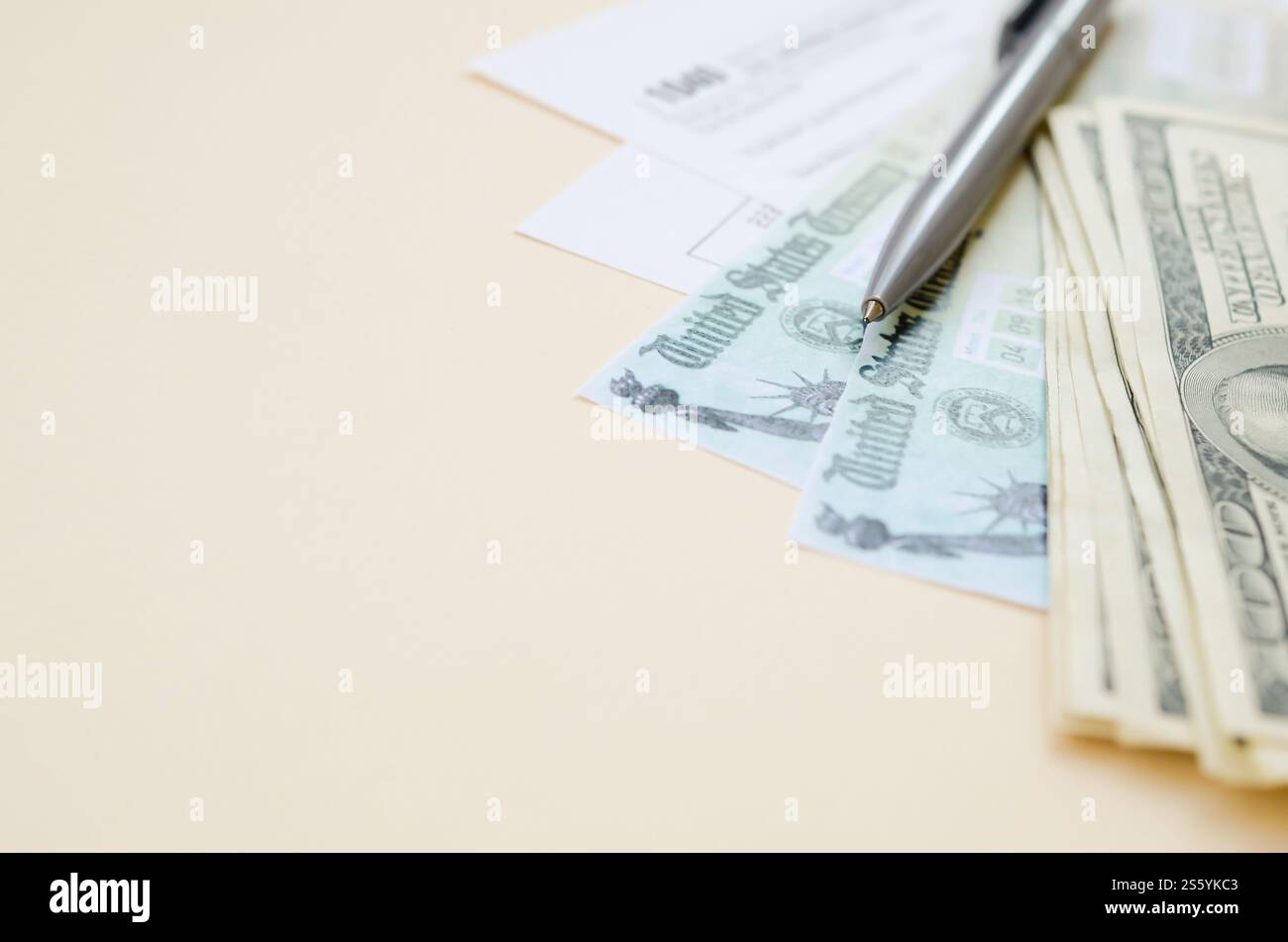 1040 Individual Income tax return form with Refund Check and hundred ...