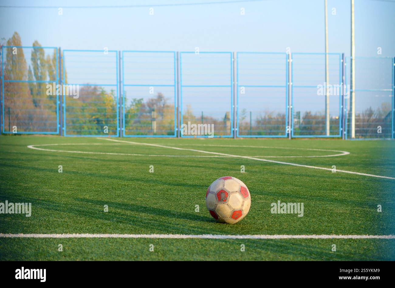 Classic soccer ball on football green grass field outdoor. Active ...