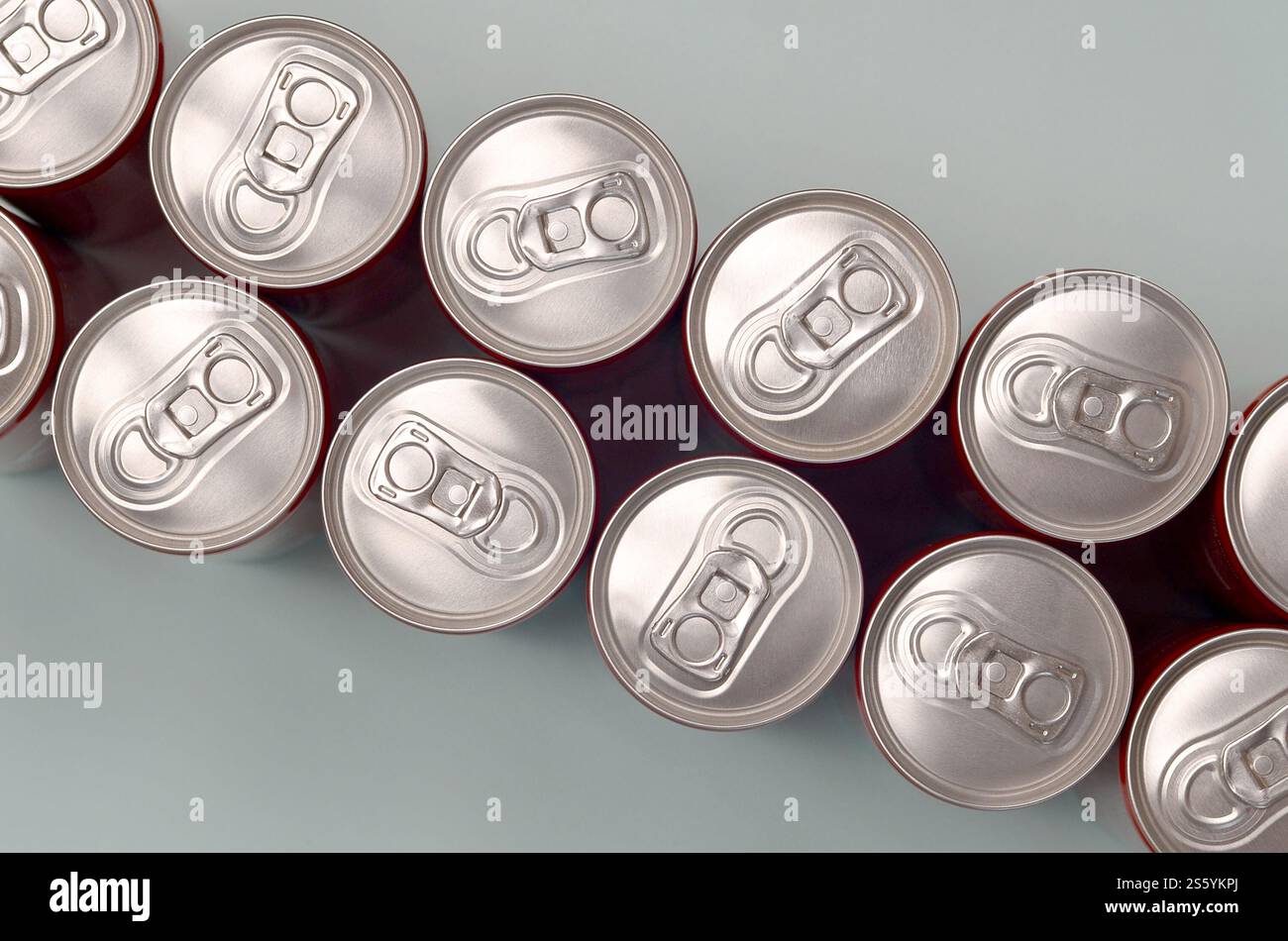 Many new aluminium cans of soda soft drink, lemonade cola, beer or ...