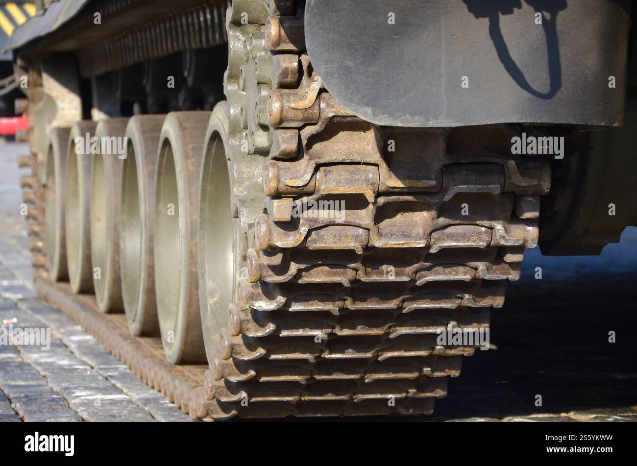Close up view of green armoured caterpillar transport. Modern military ...