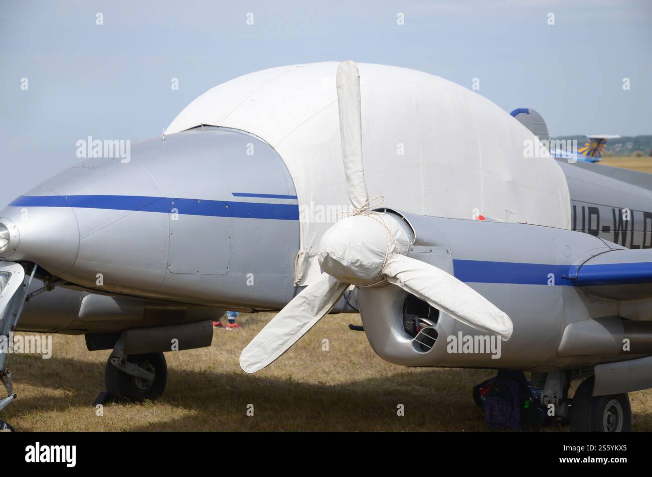 Fabric cover protects the glass and propeller of the aircraft from ...