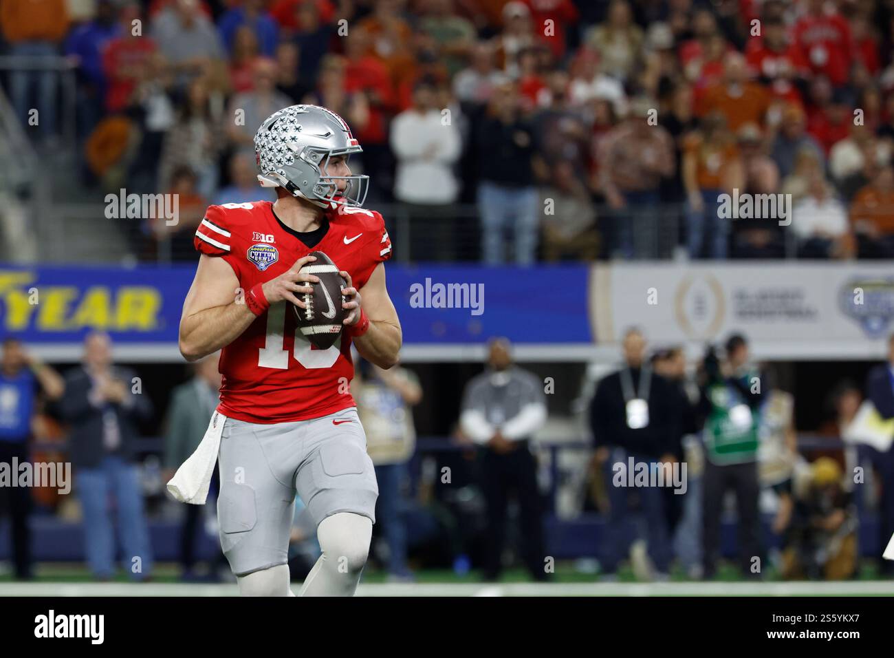 Ohio State quarterback Will Howard (18) looks to pass during the Cotton ...