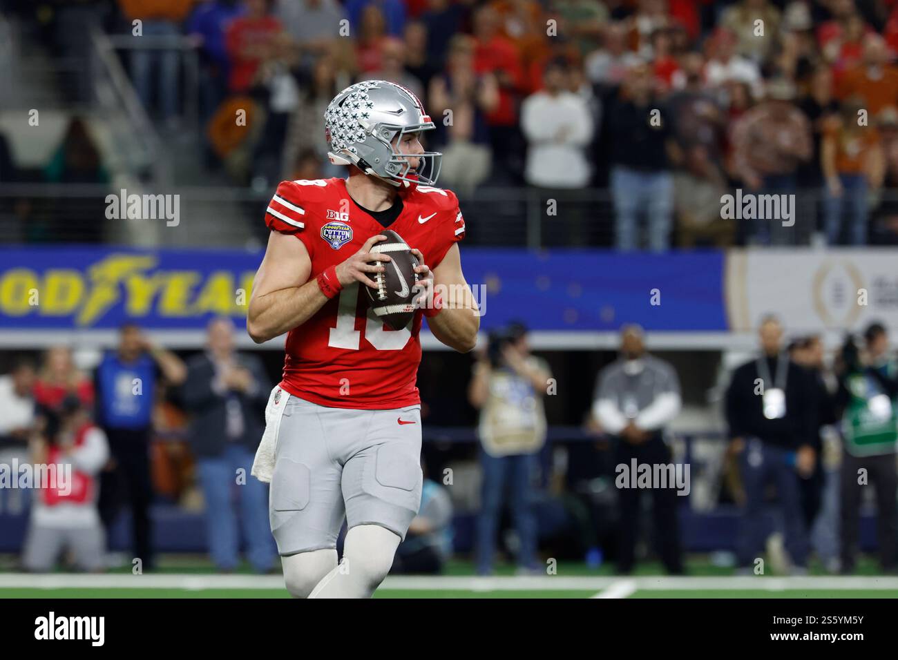 Ohio State quarterback Will Howard (18) looks to pass during the Cotton ...