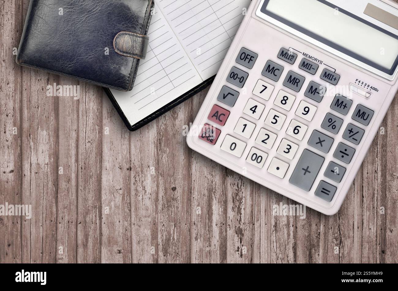 Office flat lay composition with big calculator, address book and black ...
