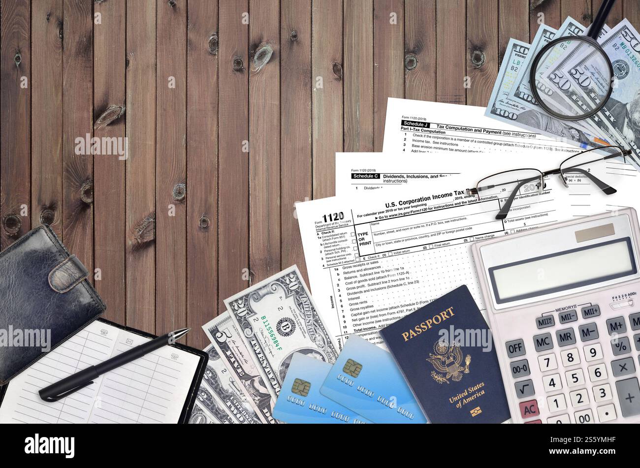 IRS form 1120 U.S. Corporation income tax return lies on flat lay ...