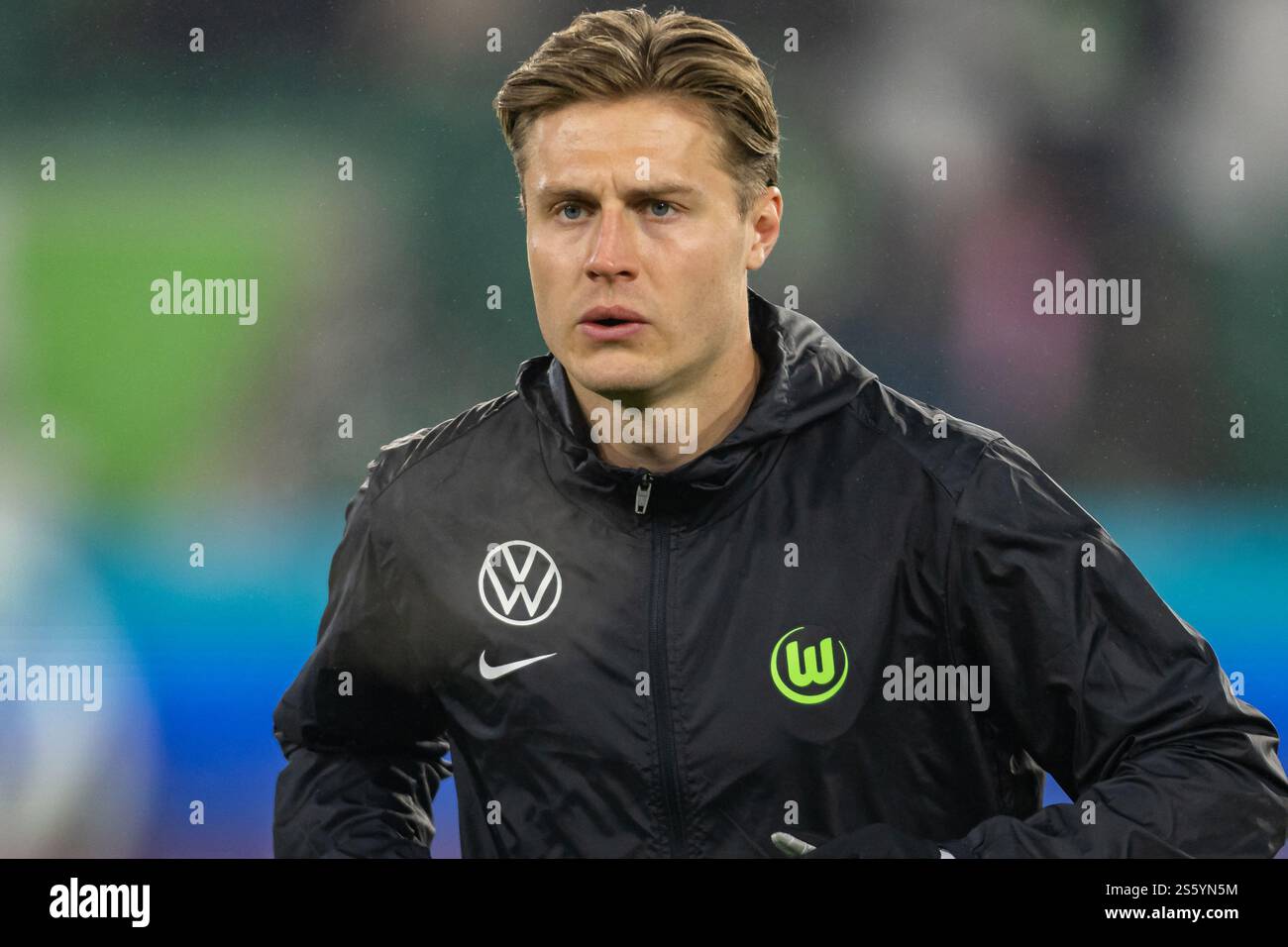 Wolfsburg, Germany. 14th Jan, 2025. Mattias Svanberg of Wolfsburg is ...