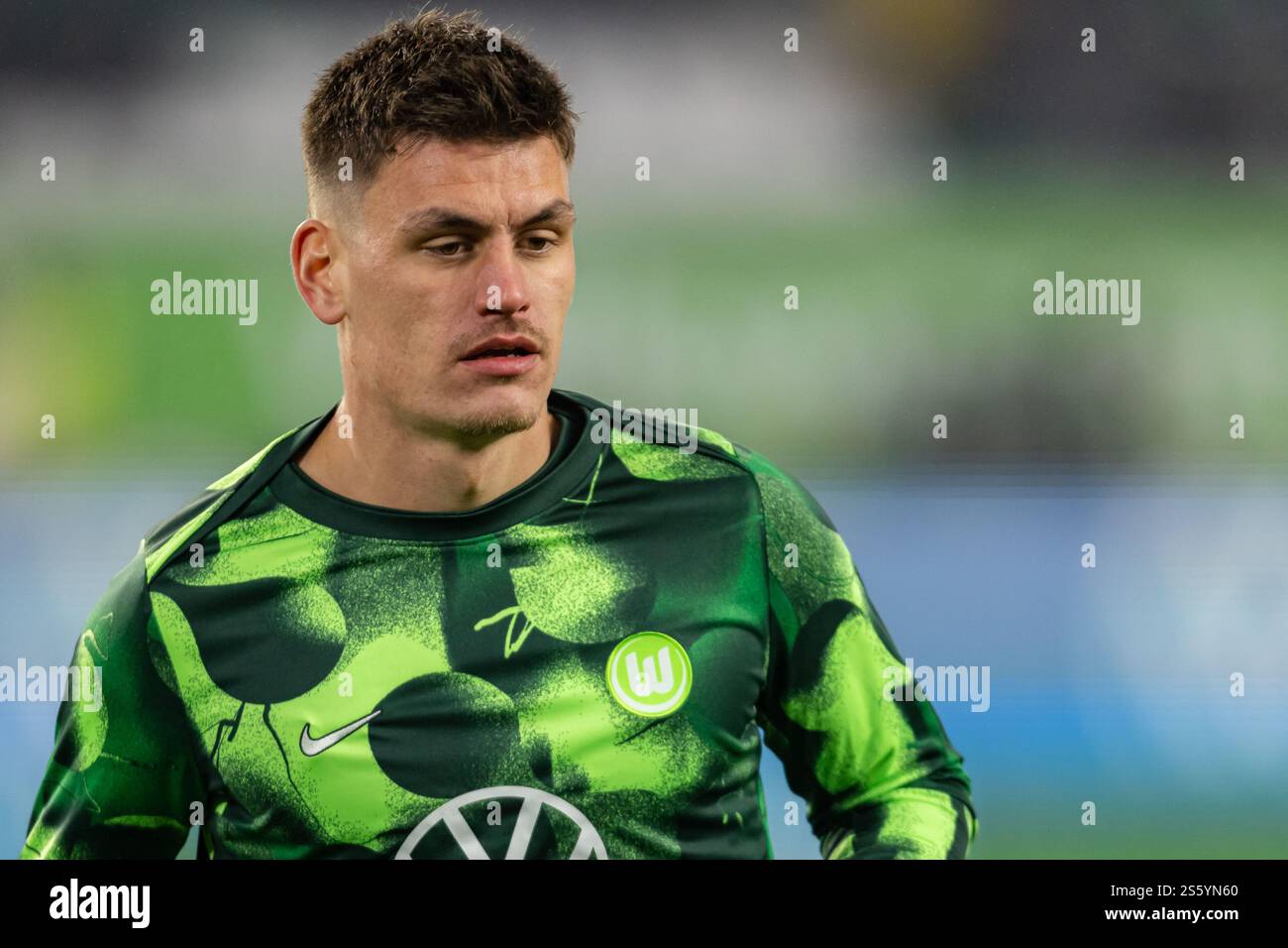 Wolfsburg, Germany. 14th Jan, 2025. Joakim Maehle of Wolfsburg is ...