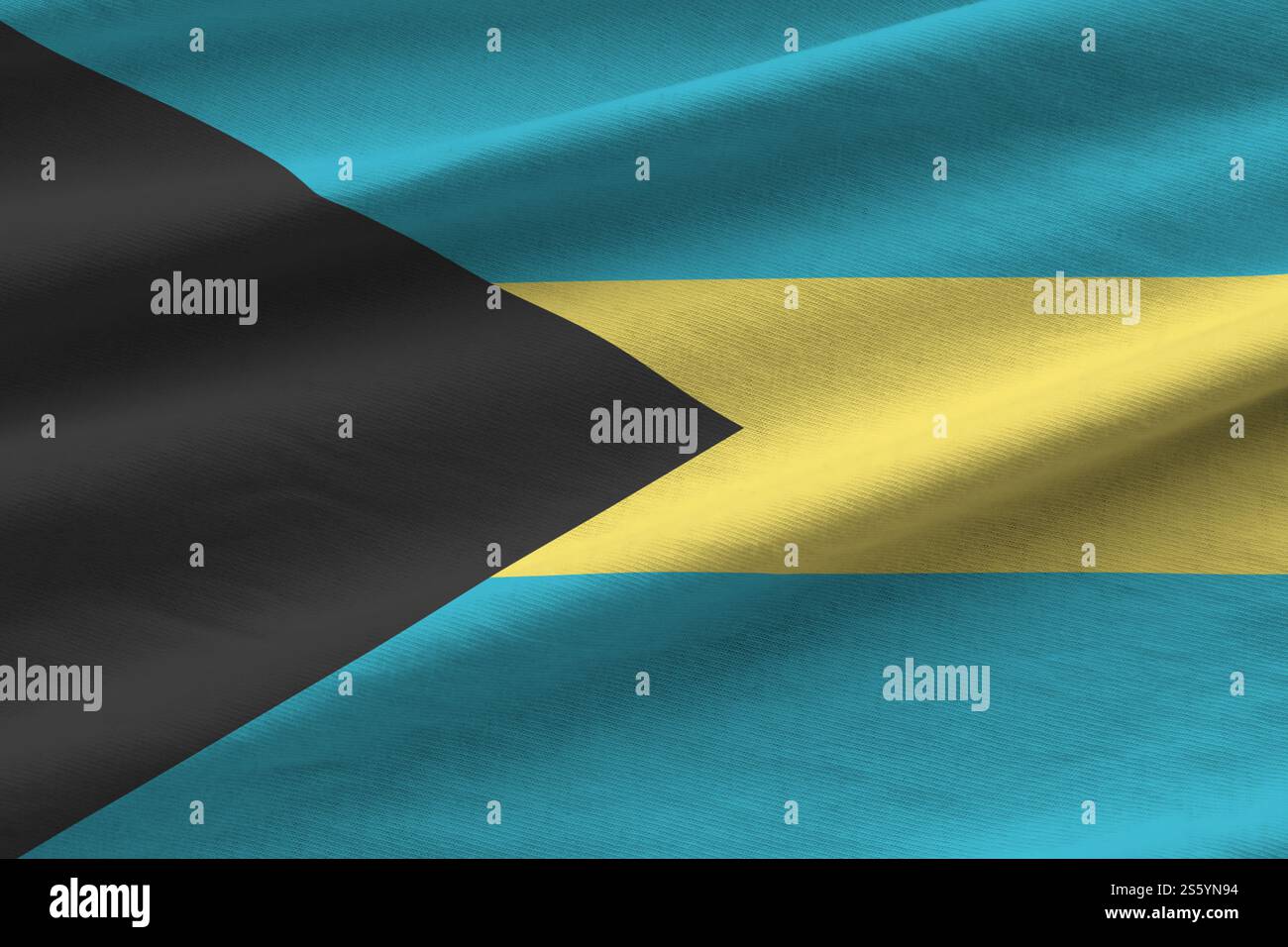 Bahamas flag with big folds waving close up under the studio light ...