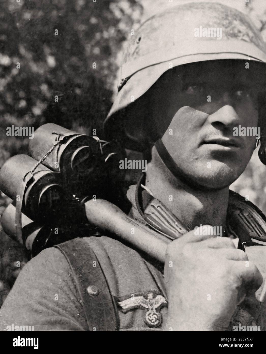 German soldier with a concentrated charge (Geballteladung) made by ...