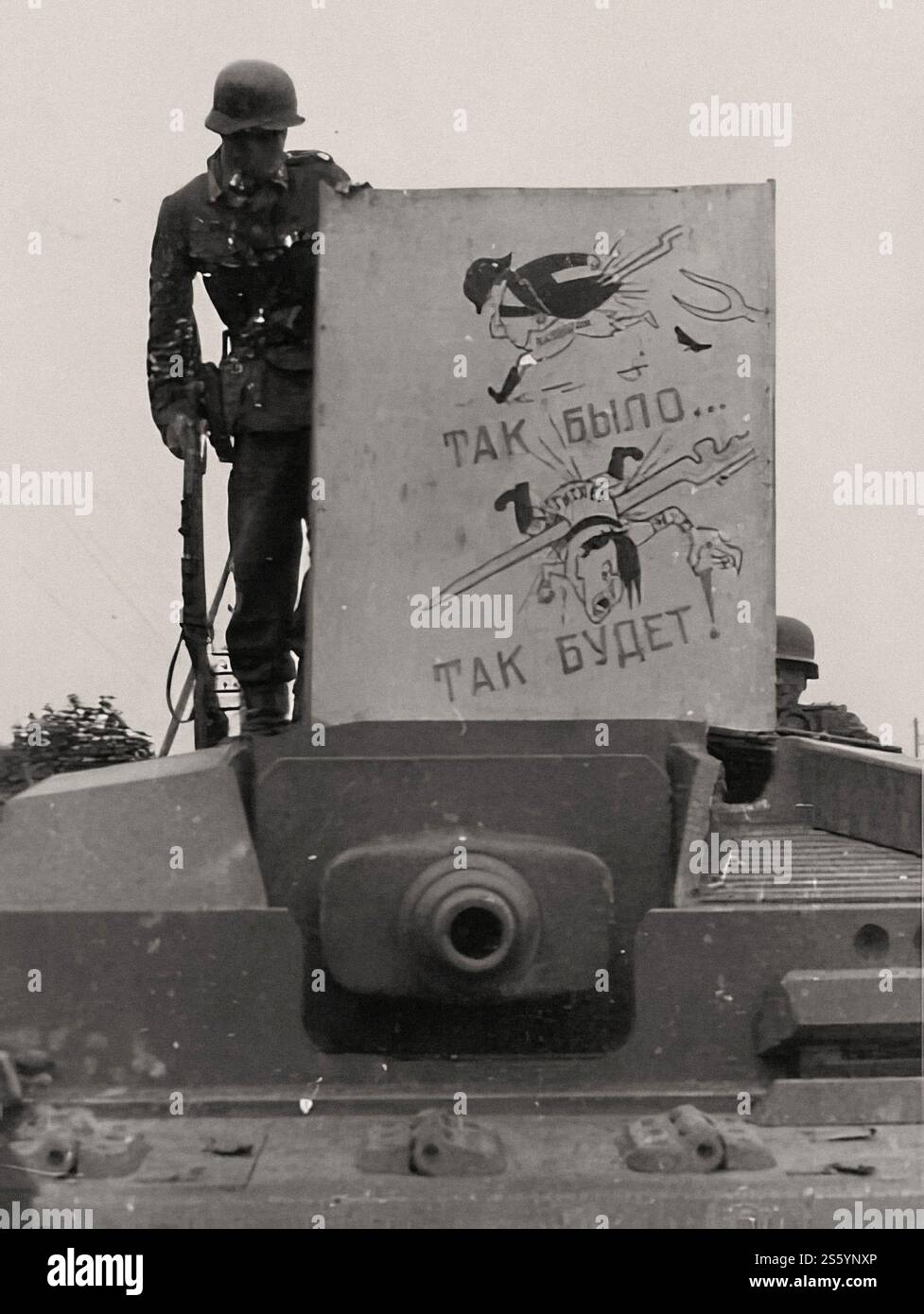 German soldiers on StuG III with the Soviet poster. - It was (Napoleon ...