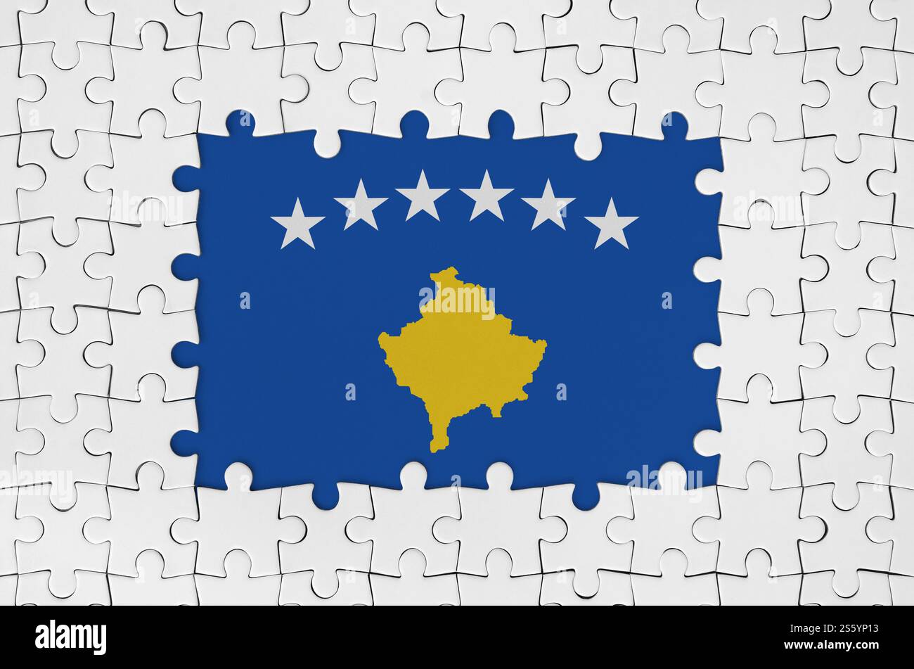 Kosovo flag in frame of white puzzle pieces with missing central parts ...
