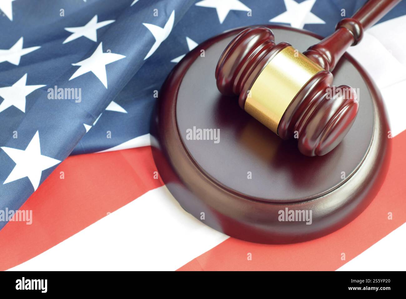 Justice mallet on United States flag in a courtroom during a judicial ...