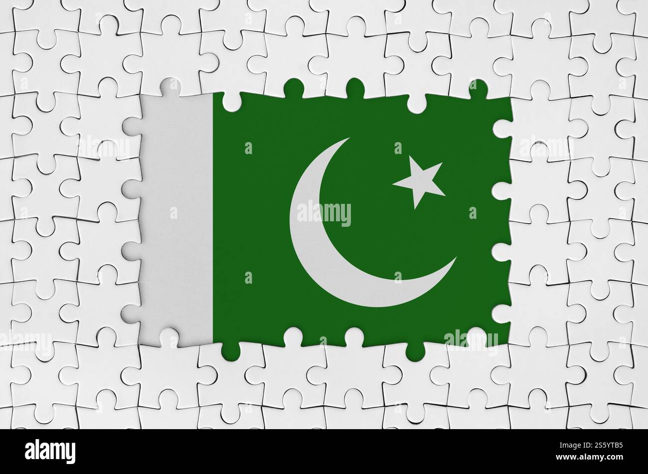 Pakistan flag in frame of white puzzle pieces with missing central ...