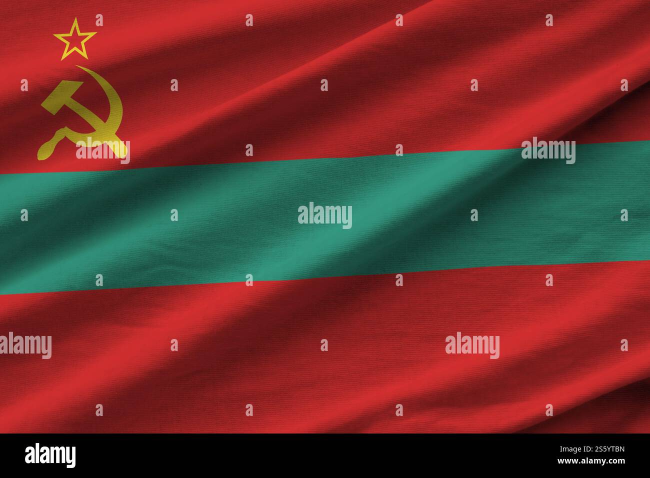 Transnistria flag with big folds waving close up under the studio light ...