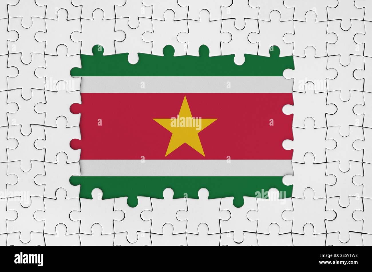 Suriname flag in frame of white puzzle pieces with missing central ...