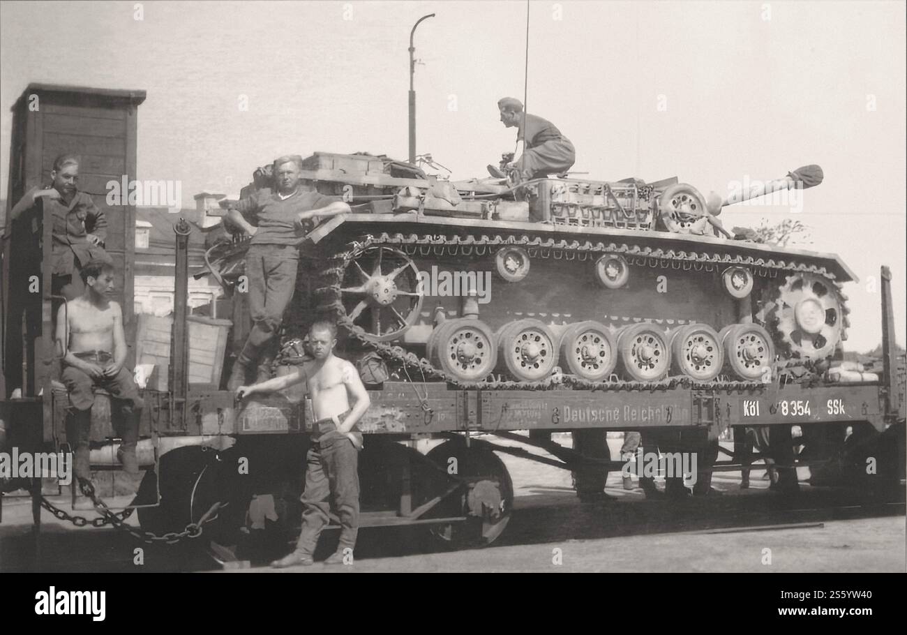 Crew of German soldiers on an armored vehicle StuG III Ausf F with ...