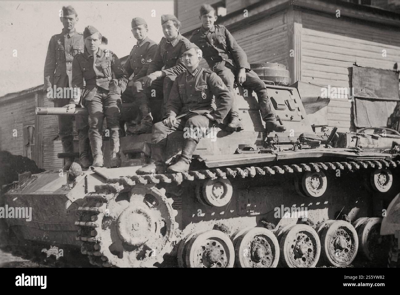 Wehrmacht troops pose for the camera on board a Pz.Kpfw III Ausf. J ...