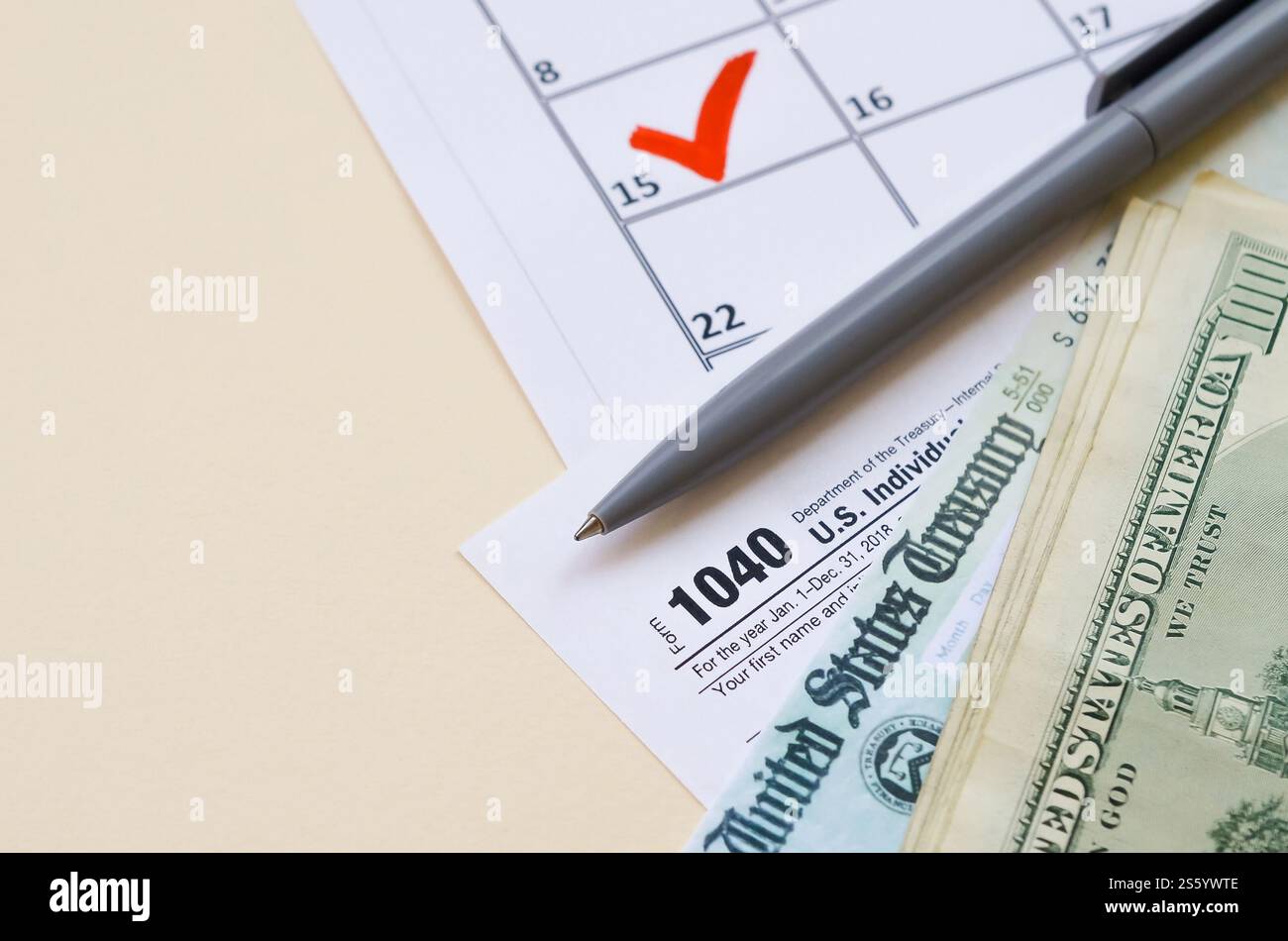 1040 Individual Income tax return form with Refund Check and hundred ...