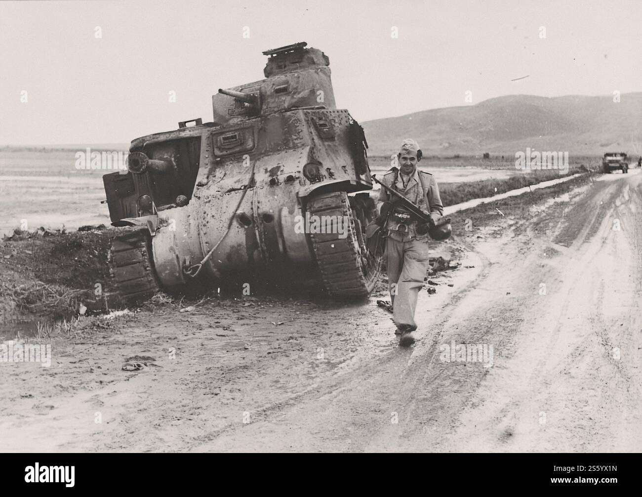 Non-commissioned officer in the Wehrmacht Afrika Korps walks past ...