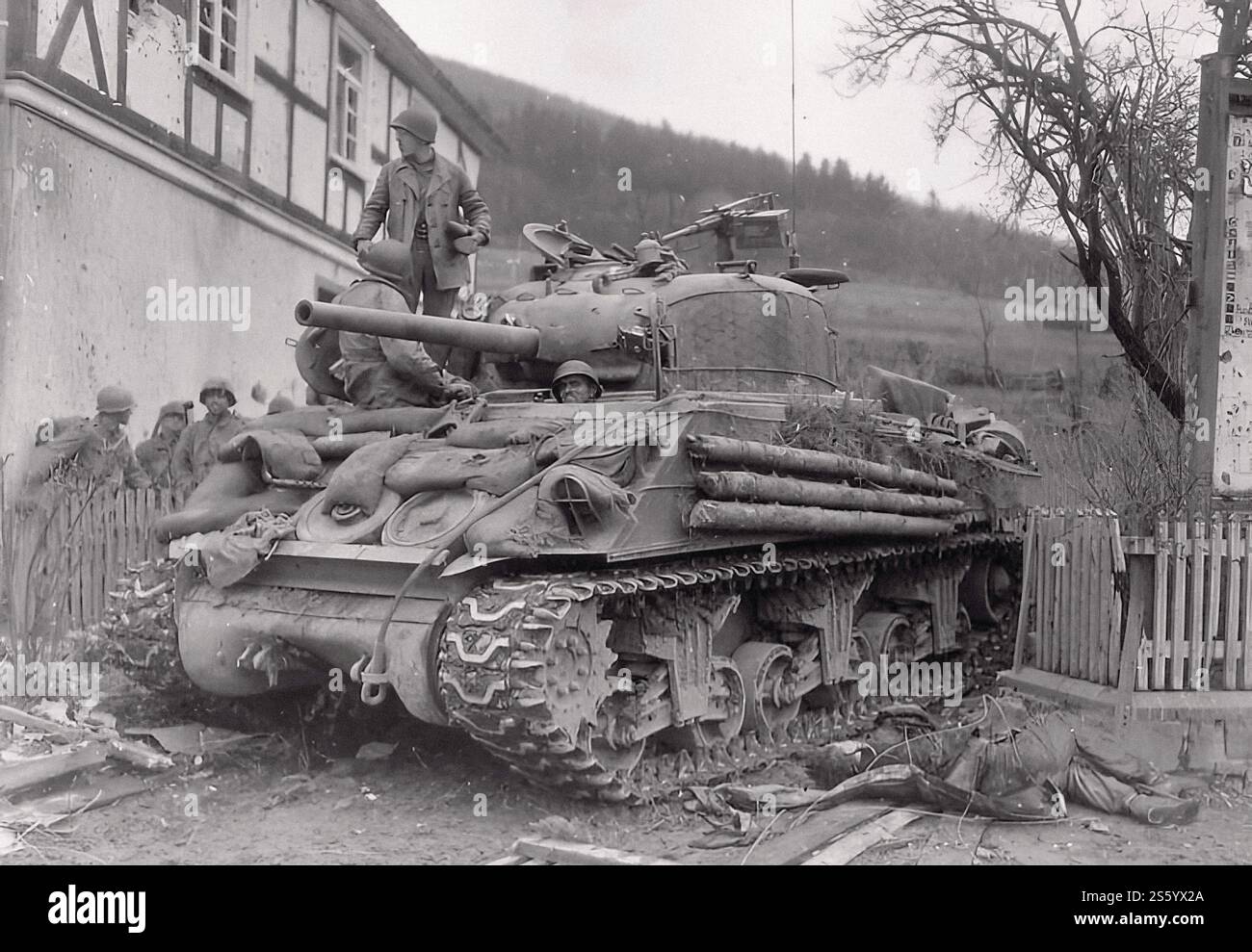 Sherman tank and the dead body of a german soldier. - Historical ...