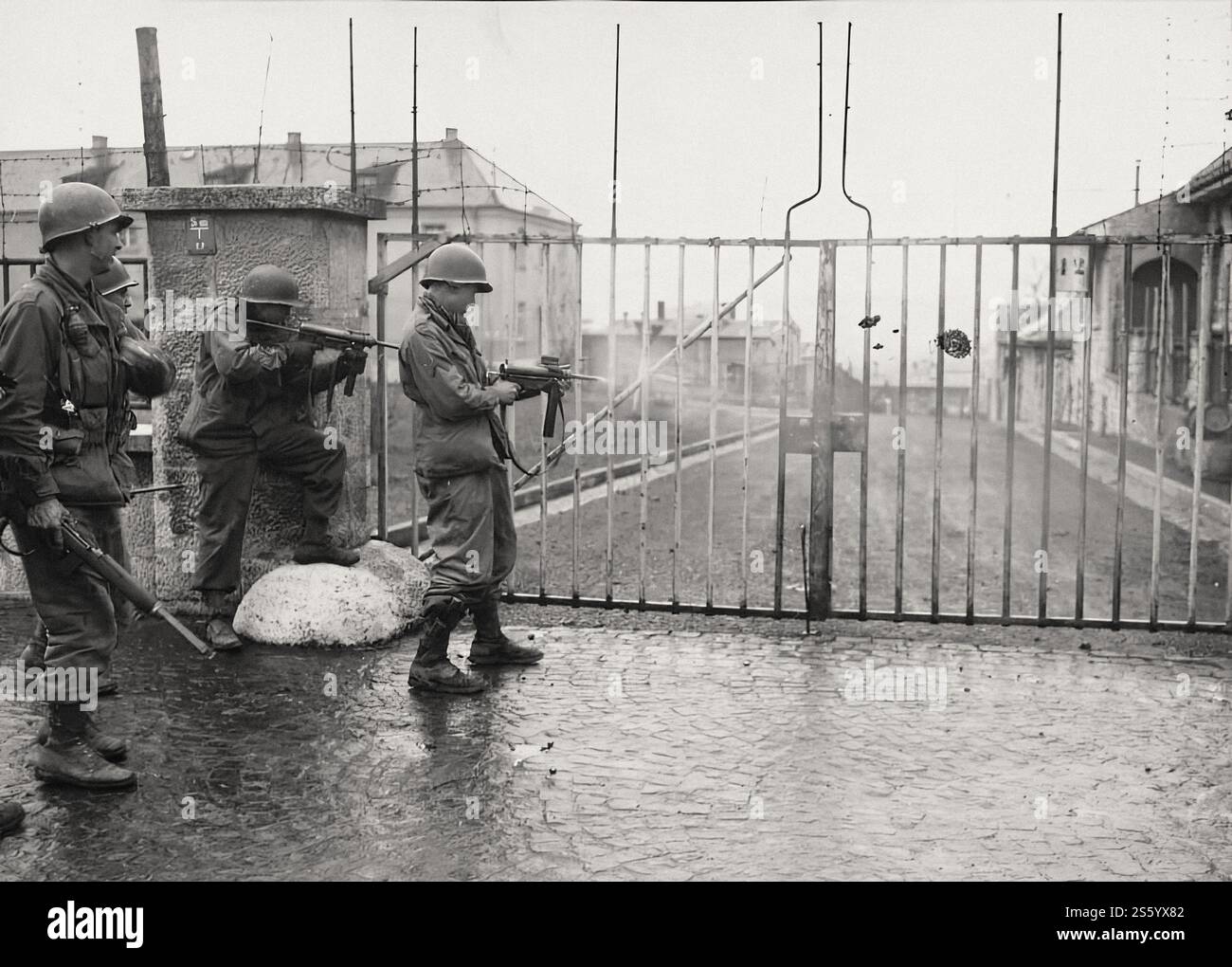 The soldiers of the 14th US Armored Division at the gates of the ...