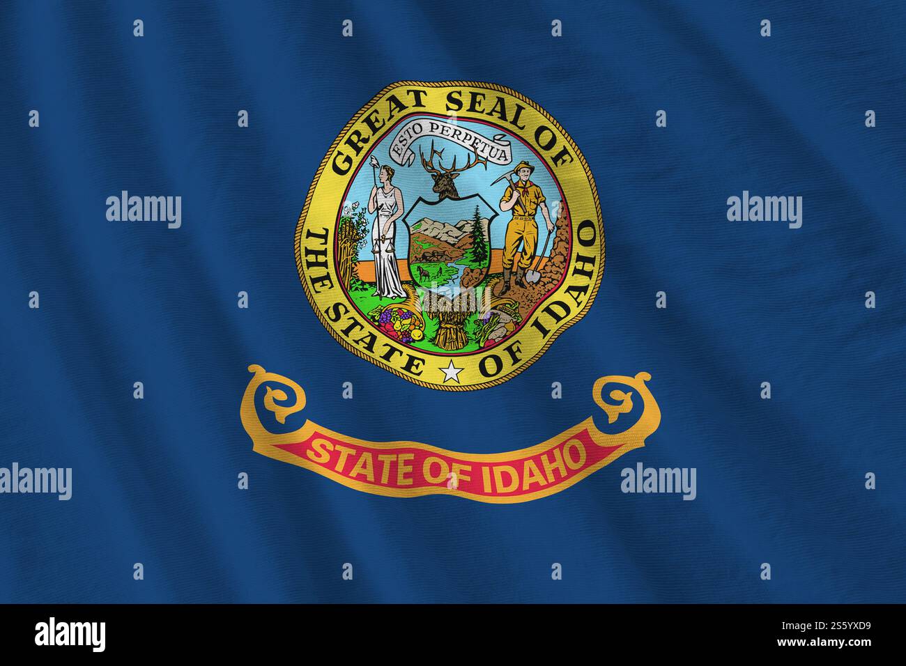 Idaho US state flag with big folds waving close up under the studio ...