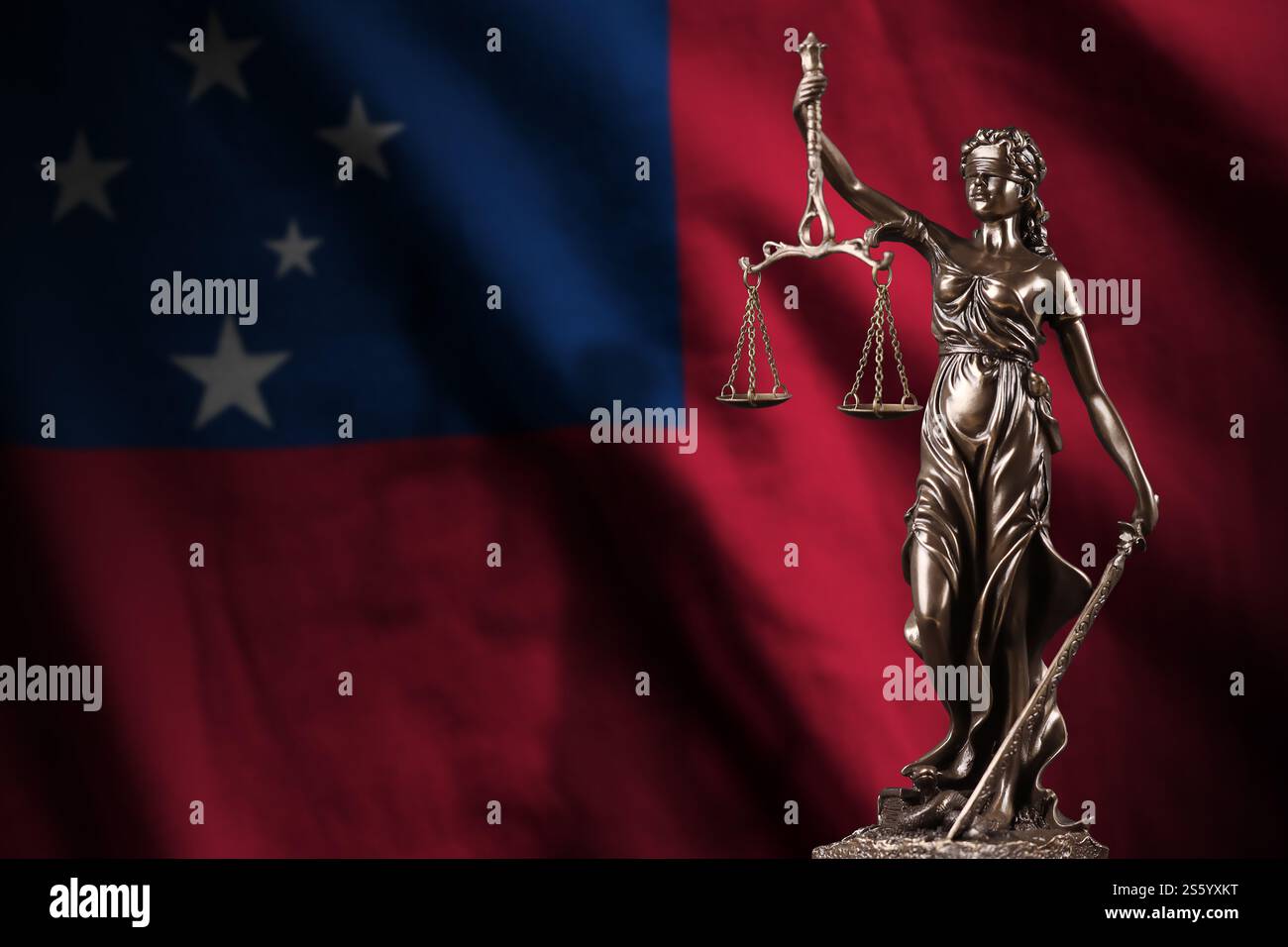 Samoa flag with statue of lady justice and judicial scales in dark room ...