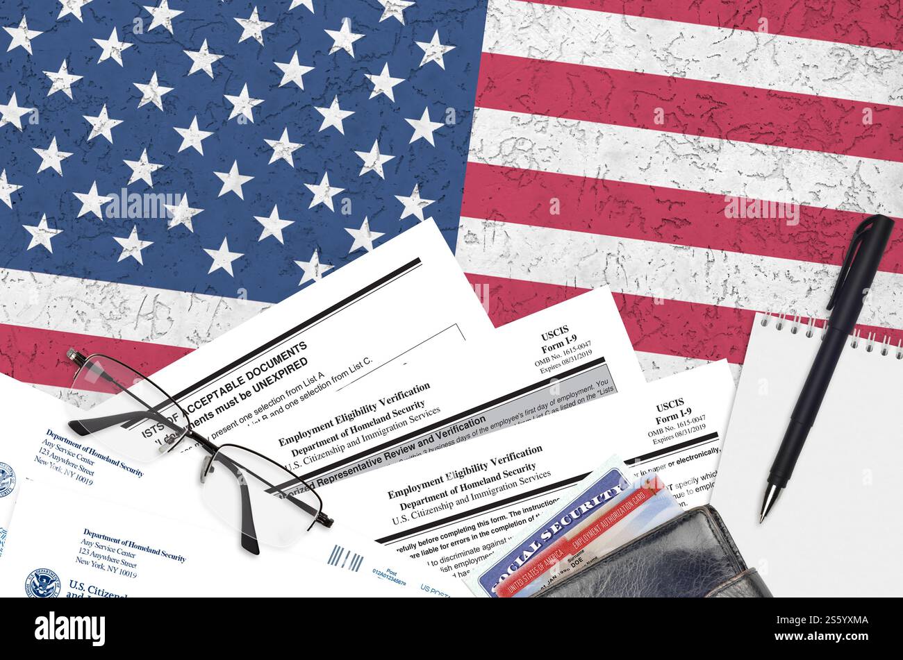 USCIS form I-9 Employment eligibility verification lies on flat lay ...