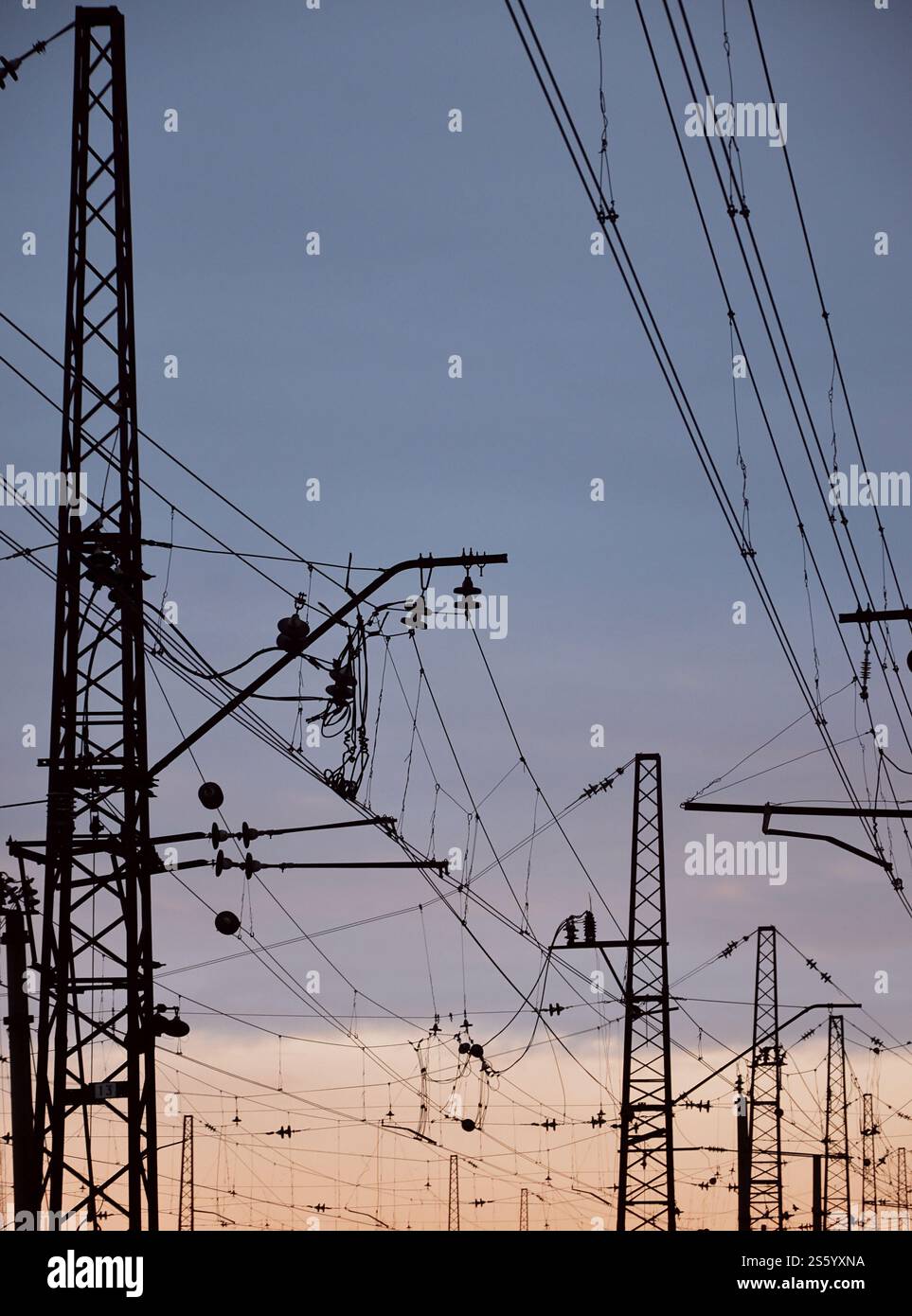Railroad overhead lines against clear blue sky, Contact wire. High ...