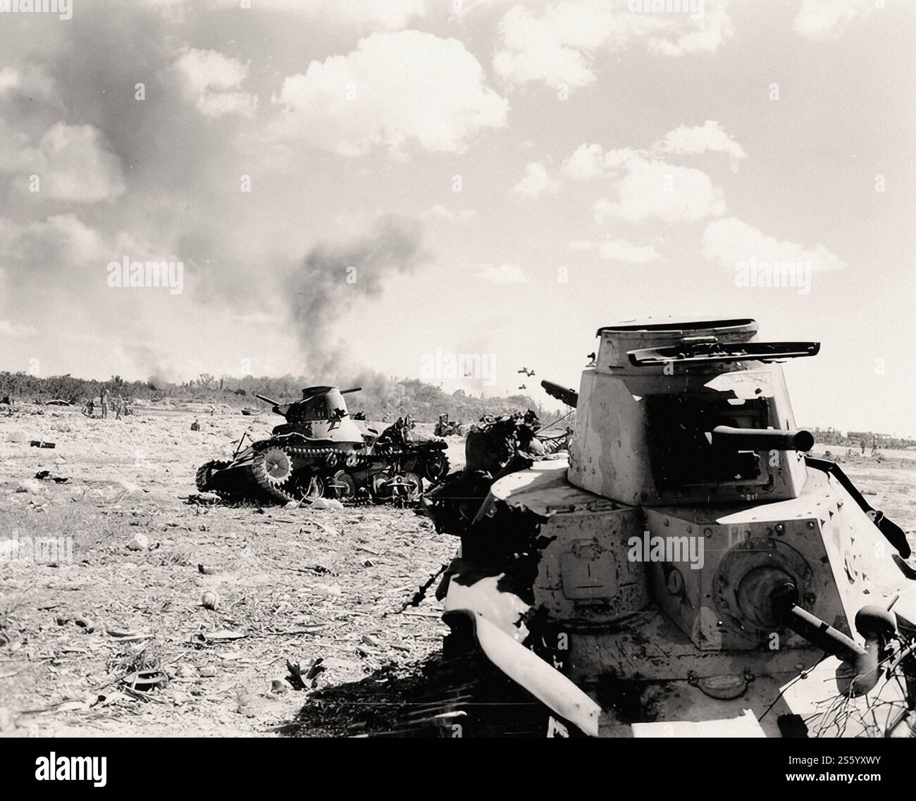 Two wrecked Japanese light tank Ha-Go on the island of Peleliu airfield ...