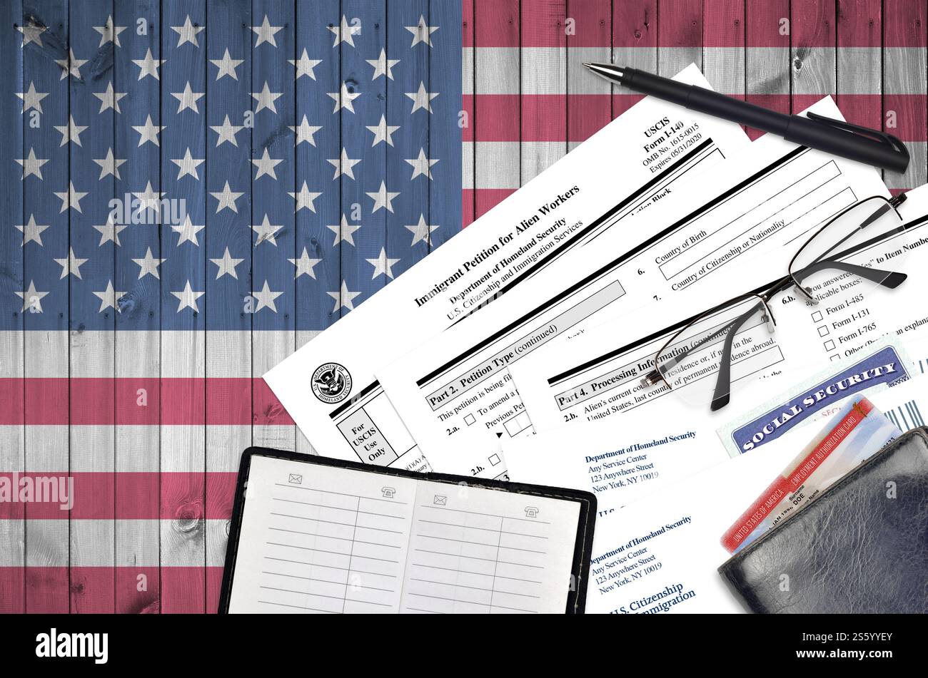 USCIS form I-140 Immigrant petition for alien workers lies on flat lay ...