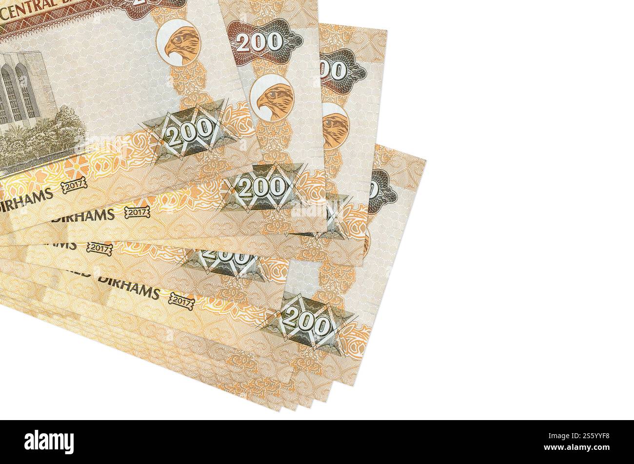 200 UAE dirhams bills lies in small bunch or pack isolated on white ...