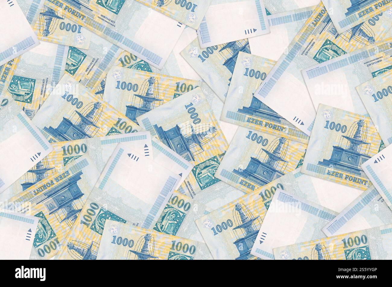 1000 Hungarian forint bills lies in big pile. Rich life conceptual ...