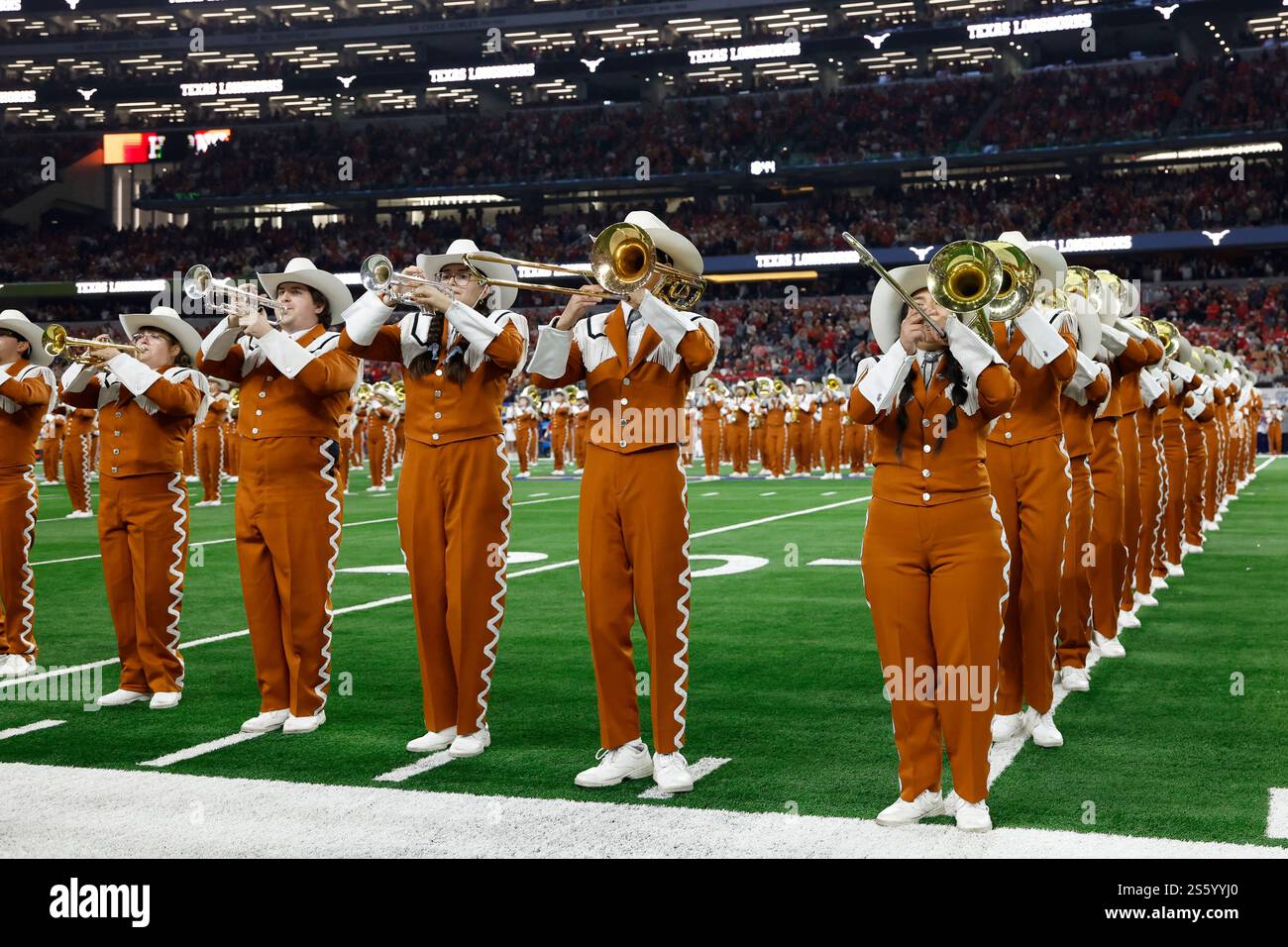 The University of Texas marching band performs during a pregame ...