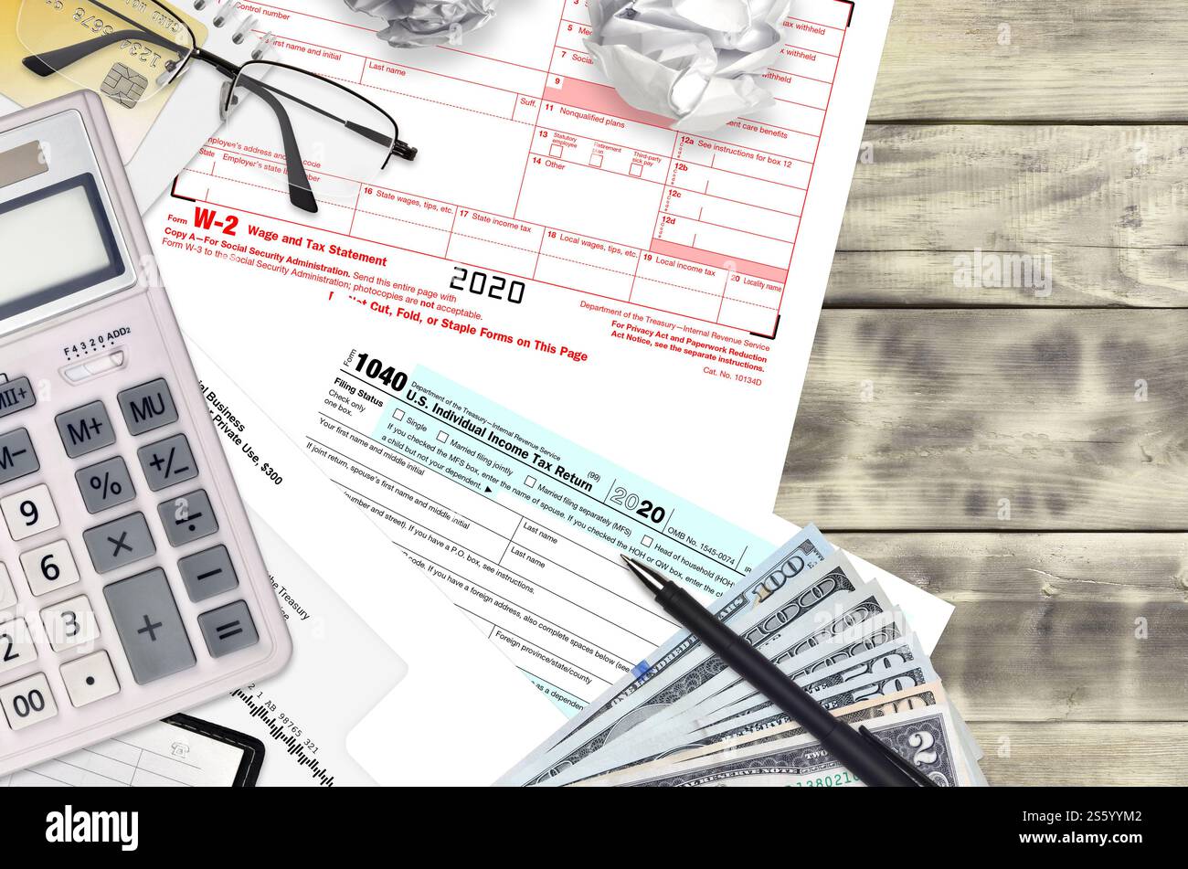 IRS form 1040 Individual income tax return and W-2 wage and tax ...